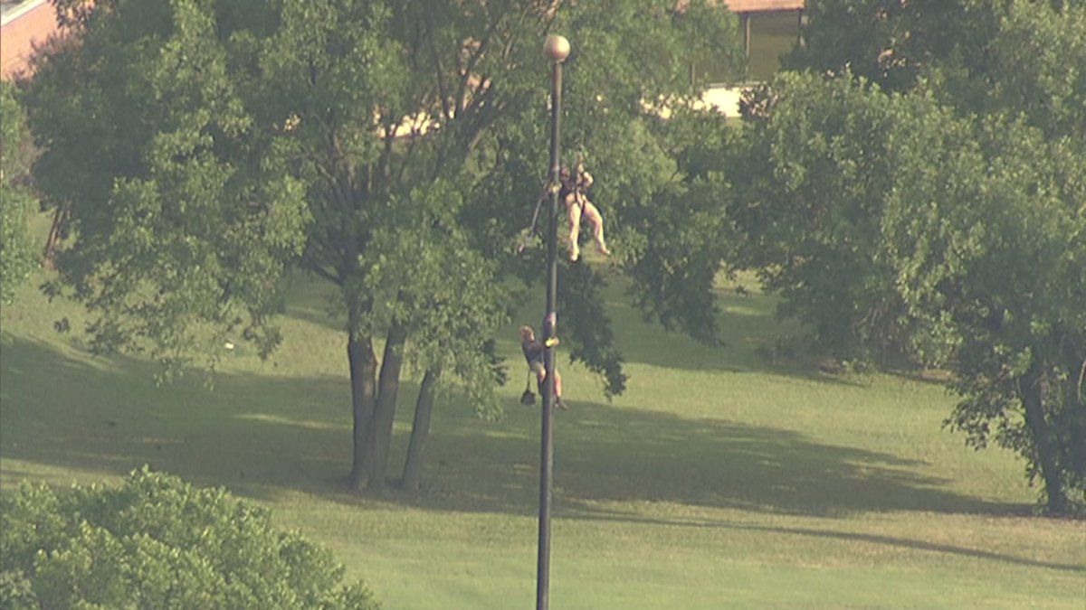 Helicopter Crew Helps Rescue Person Stuck at Top of Flag Pole – NBC 5 ...