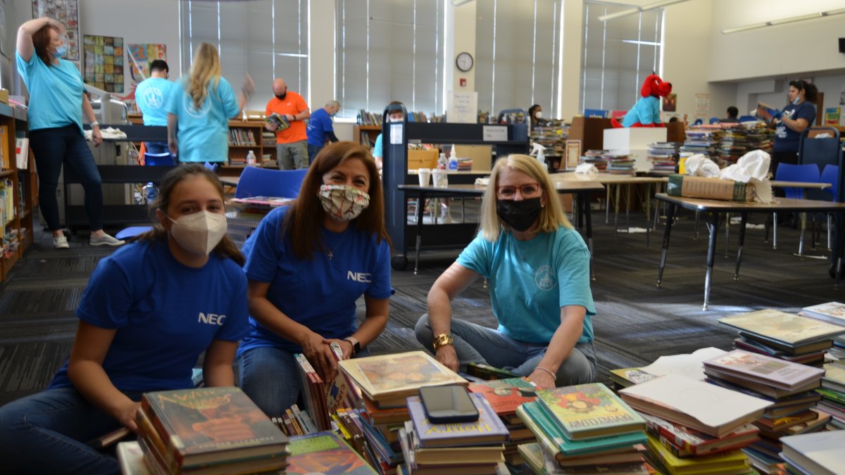 Volunteers Restoring Herbert Marcus Elementary Library After Winter ...