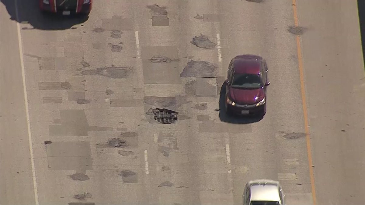 Winter Storm Creates Large Pothole on Dallas Highway, Damages Several ...