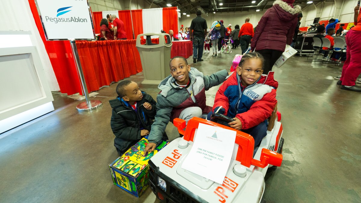 Dallas family charity event provides toys, clothes , household items ...