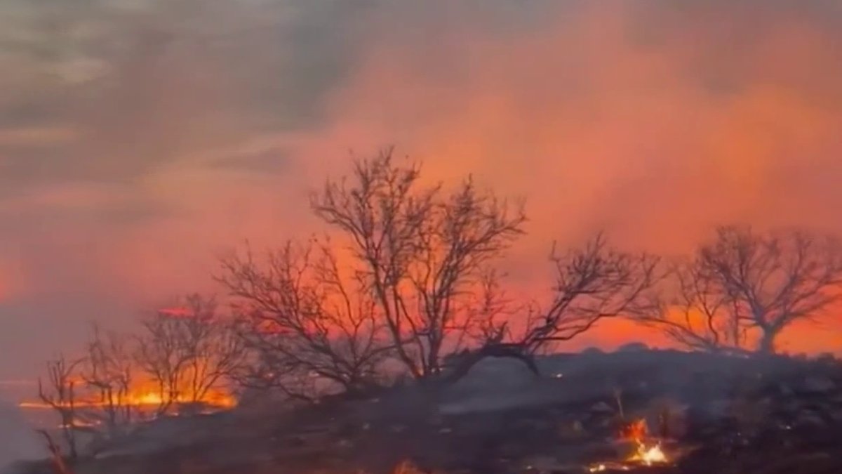 Evacuations, power outages continue as wildfires spread across the ...