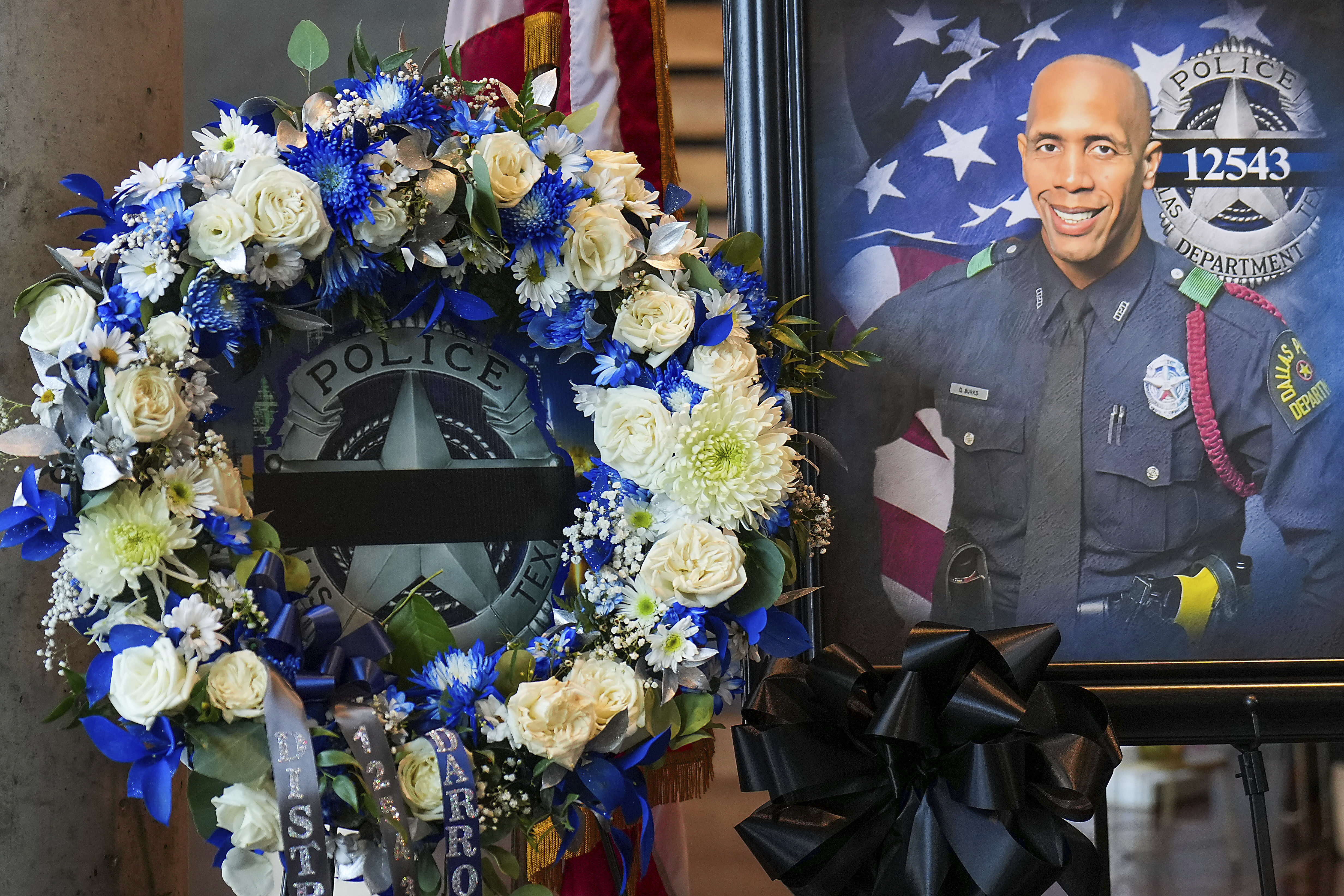 Fallen Dallas police officer laid to rest after service draws hundreds ...