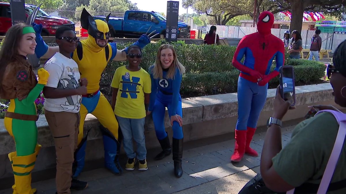 Cops in superhero costumes greet young fairgoers at Fair Park – NBC 5 ...