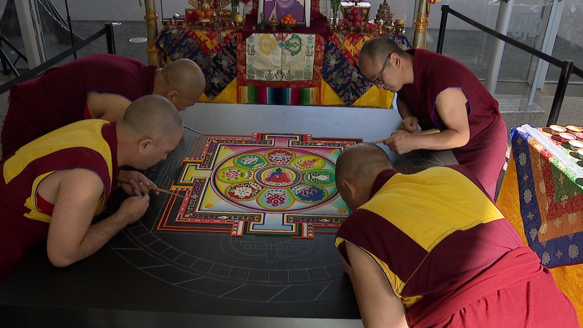 Buddhist monks creating mandala meticulously painted with sand – NBC 5 ...