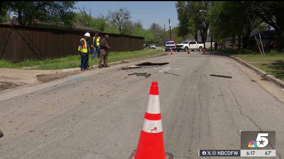 Dallas sinkhole swallows part of a truck sending driver to the hospital ...