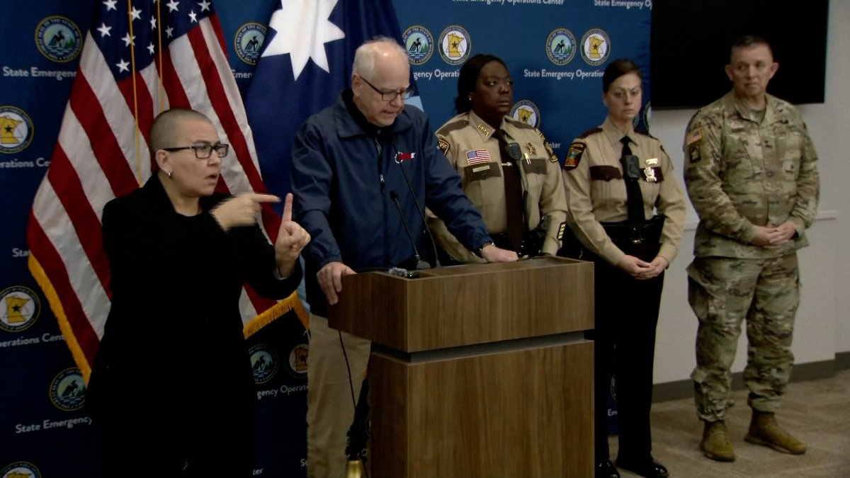Minnesota Gov. Tim Walz reacts after immigration officer killed a man ...